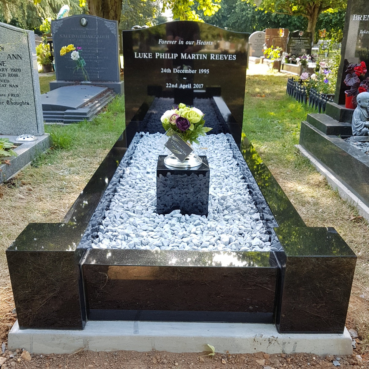 Ogee headstone with kerbs and corner posts – A. Clarke Memorials