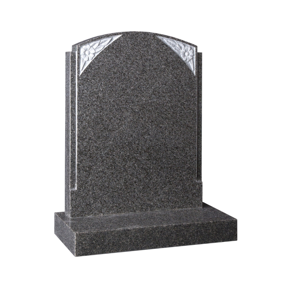 Ogee shaped memorial with rebated edges and carved flowers to corners ...